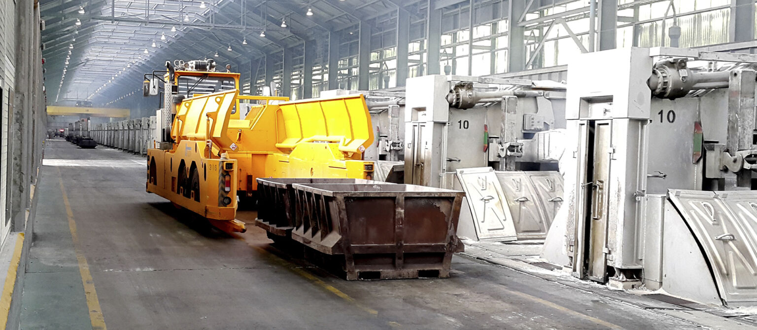 Anode pallet transport vehicle - Hencon